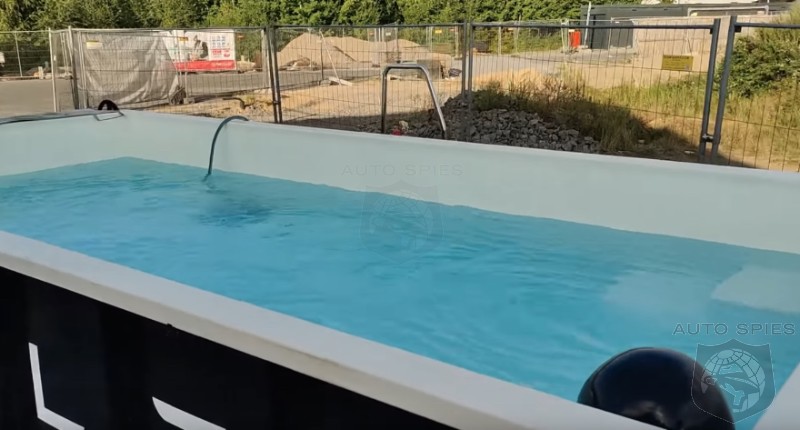 WATCH: Tesla Installing Swiming Pool At Supercharging Station ...