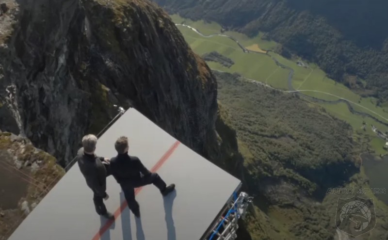 WATCH: Tom Cruise Jumps A Motorcycle Off Norwegian Cliff In Latest ...